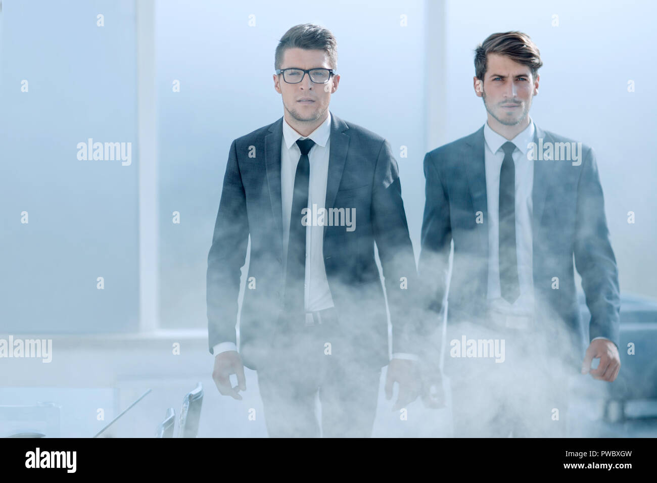 Businessman in office room smoke hi-res stock photography and images ...