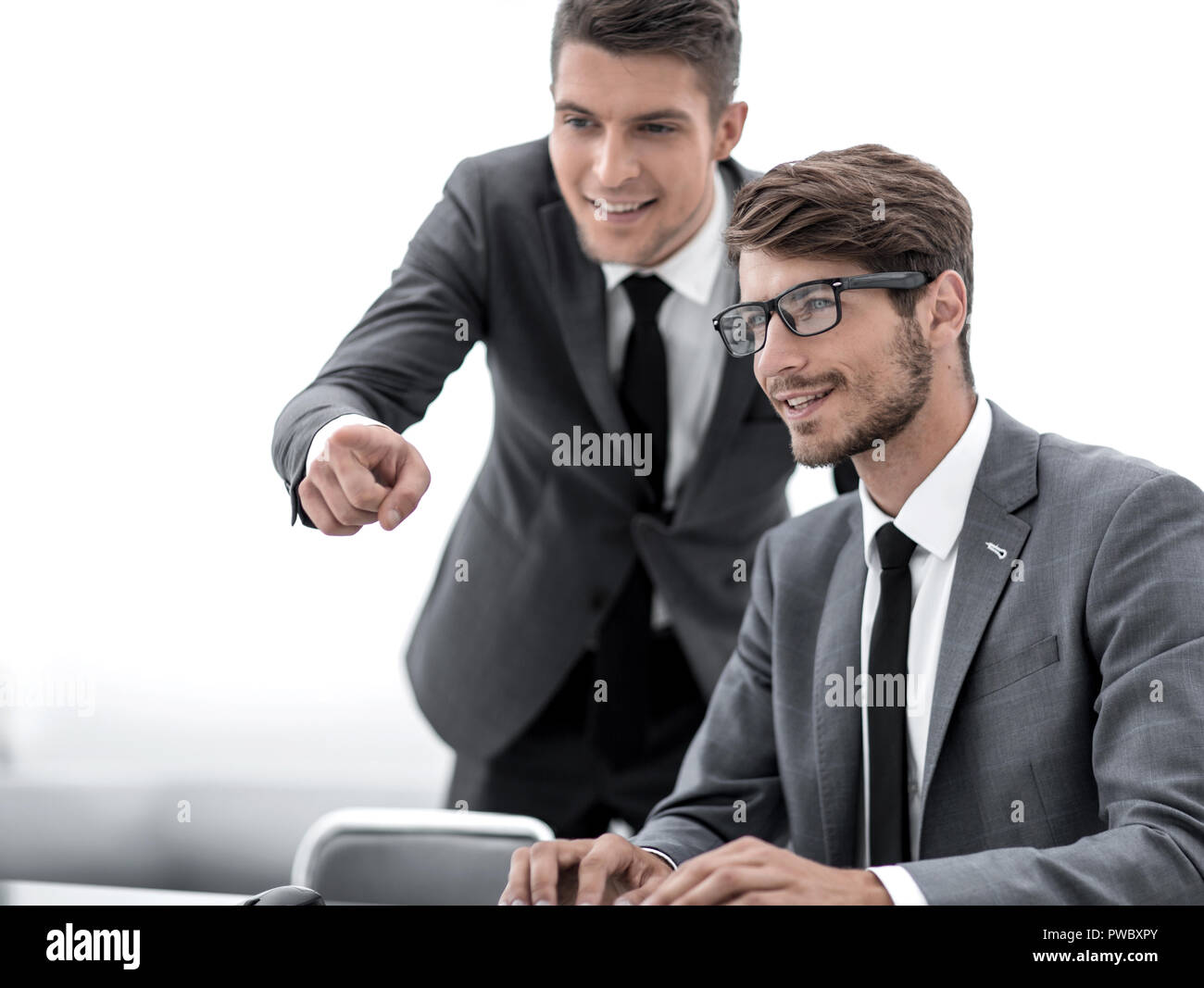 Successful adult man is looking at screen of modern gadget Stock Photo ...