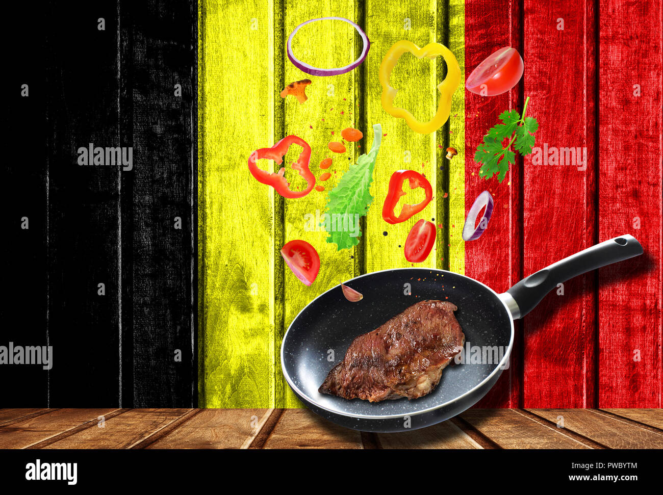 Cooking process. Hot movement. Fresh vegetables falling into the pan ...