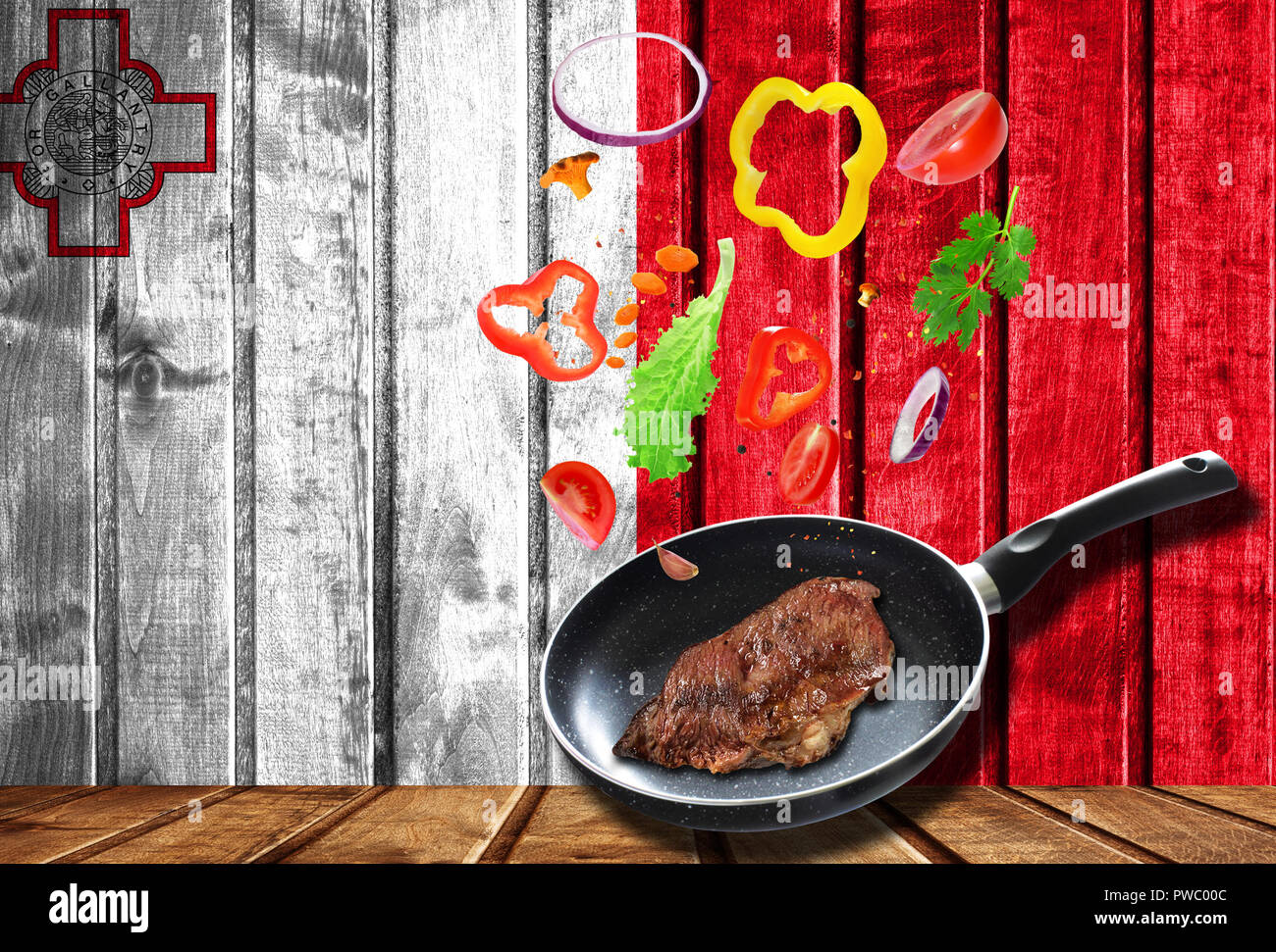 Cooking process. Hot movement. Fresh vegetables falling into the pan ...