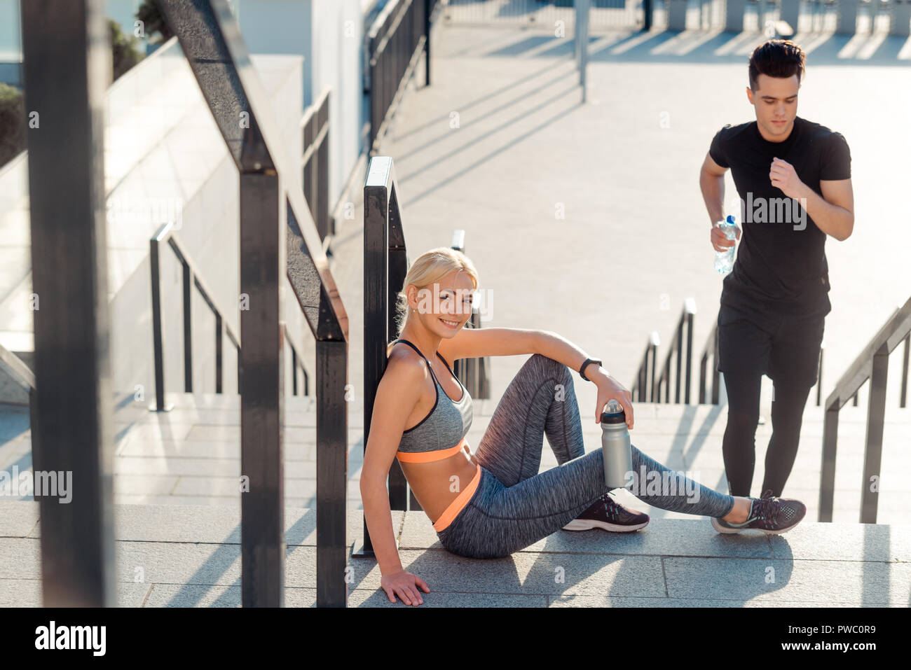 Woman runner having rest hi-res stock photography and images - Alamy