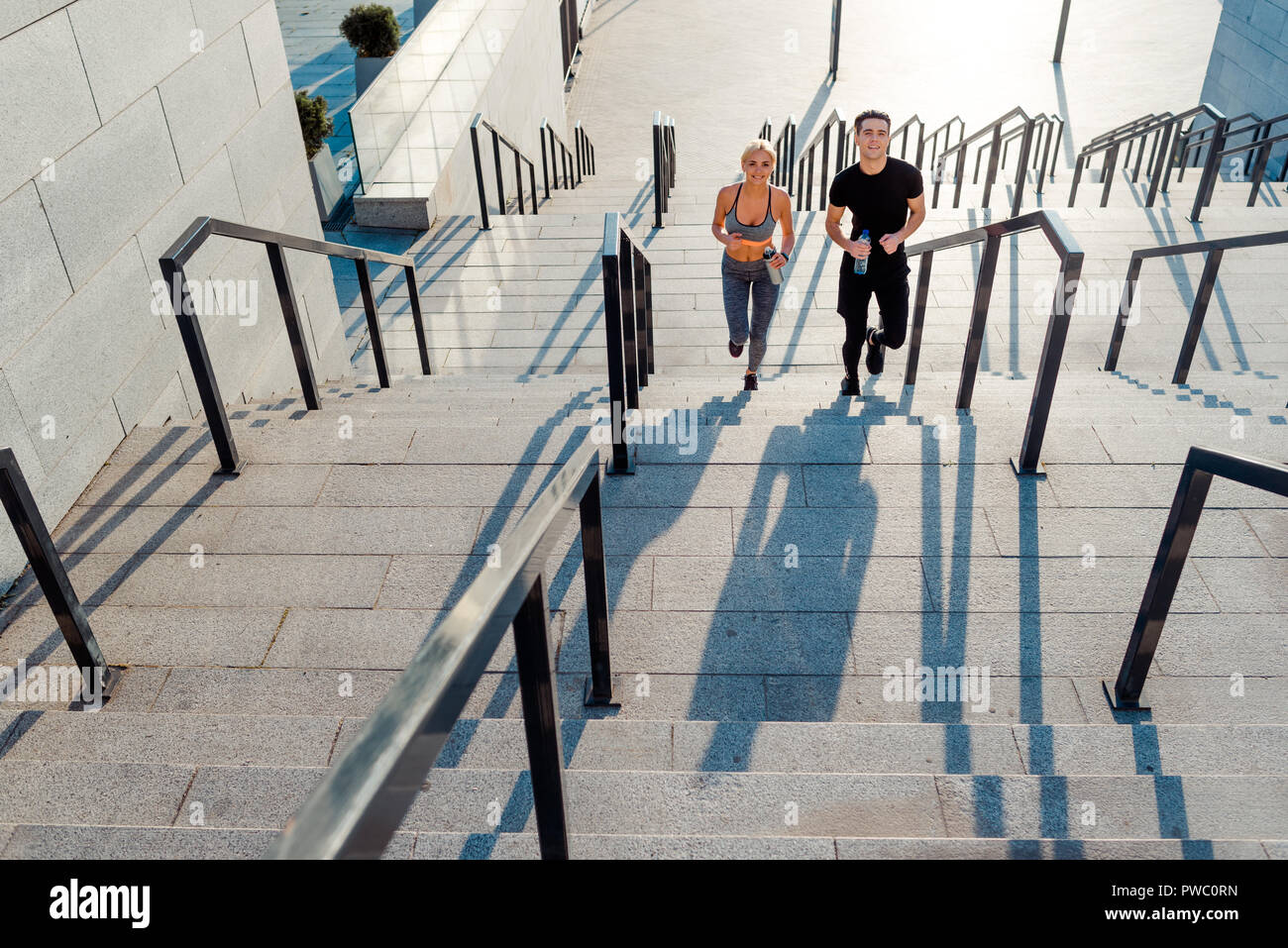 Couple training outdoors going hi-res stock photography and images - Alamy