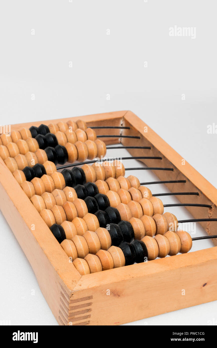Wooden abacus on a white background Stock Photo - Alamy