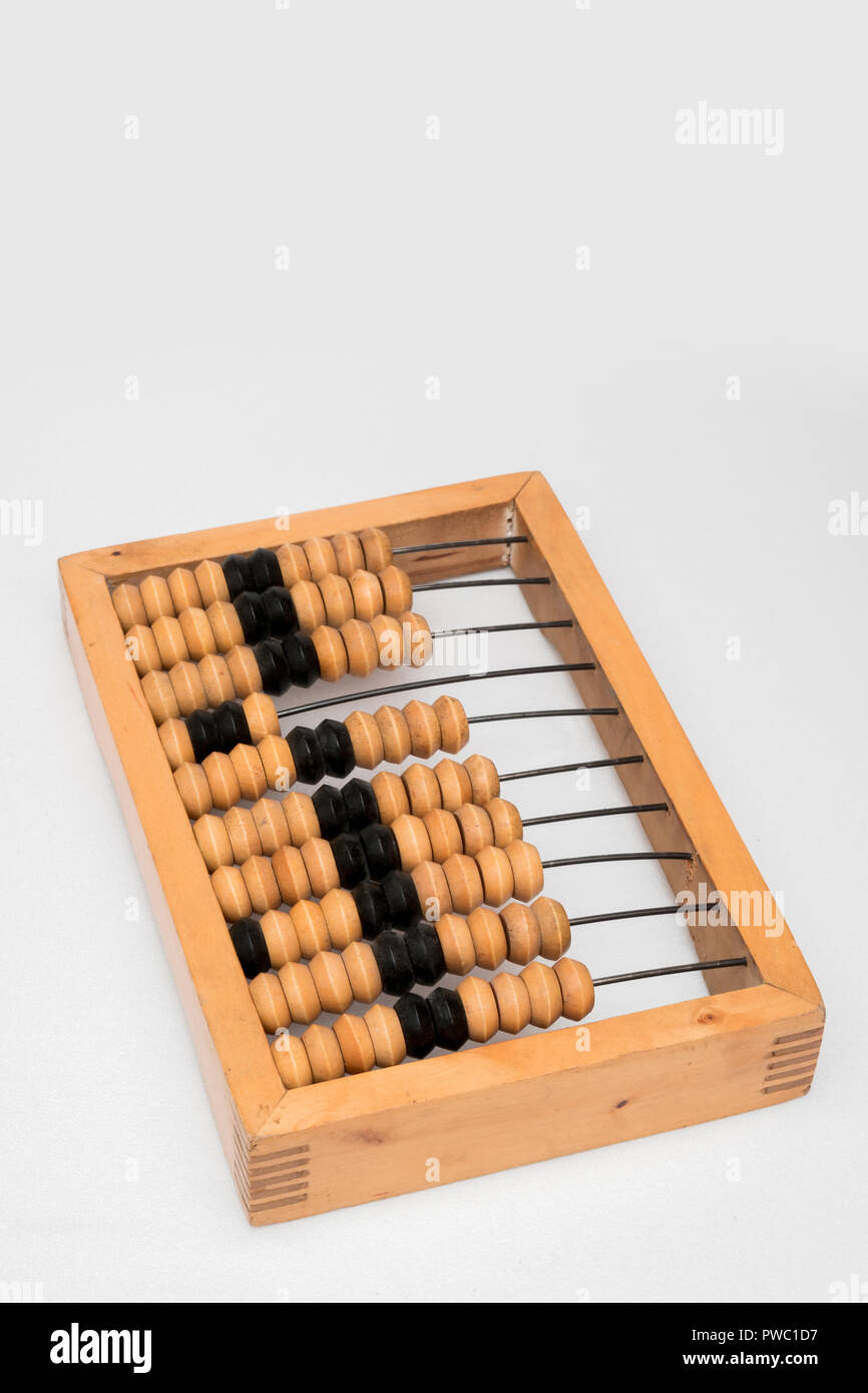 Wooden abacus on a white background Stock Photo - Alamy