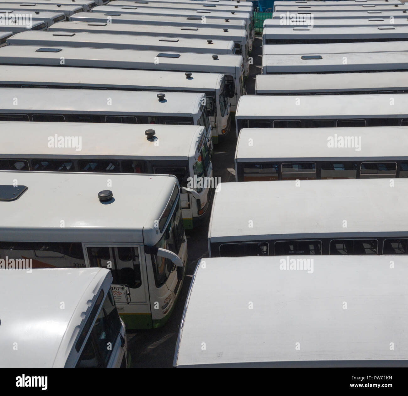Buses parked in bus depot hi-res stock photography and images - Alamy