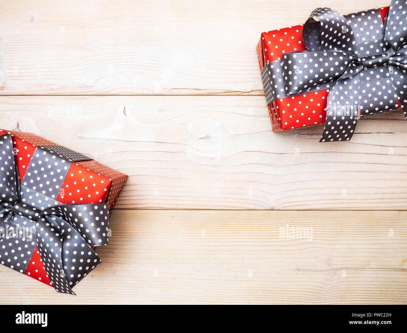 Composition of packed present boxes on wooden board. Celebrations ...