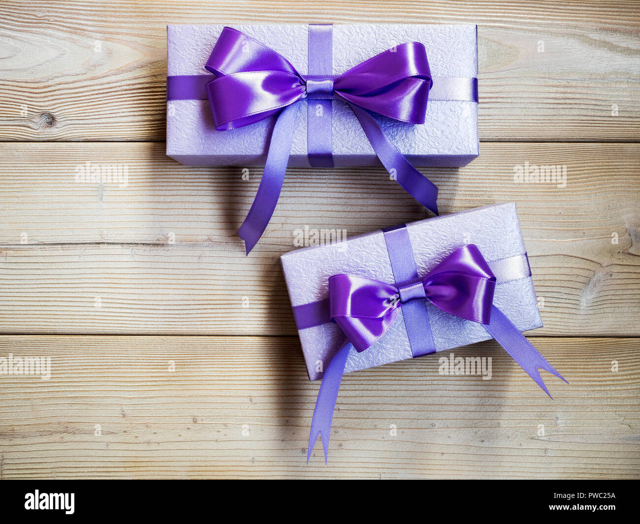 Composition of packed present boxes on wooden board. Celebrations ...