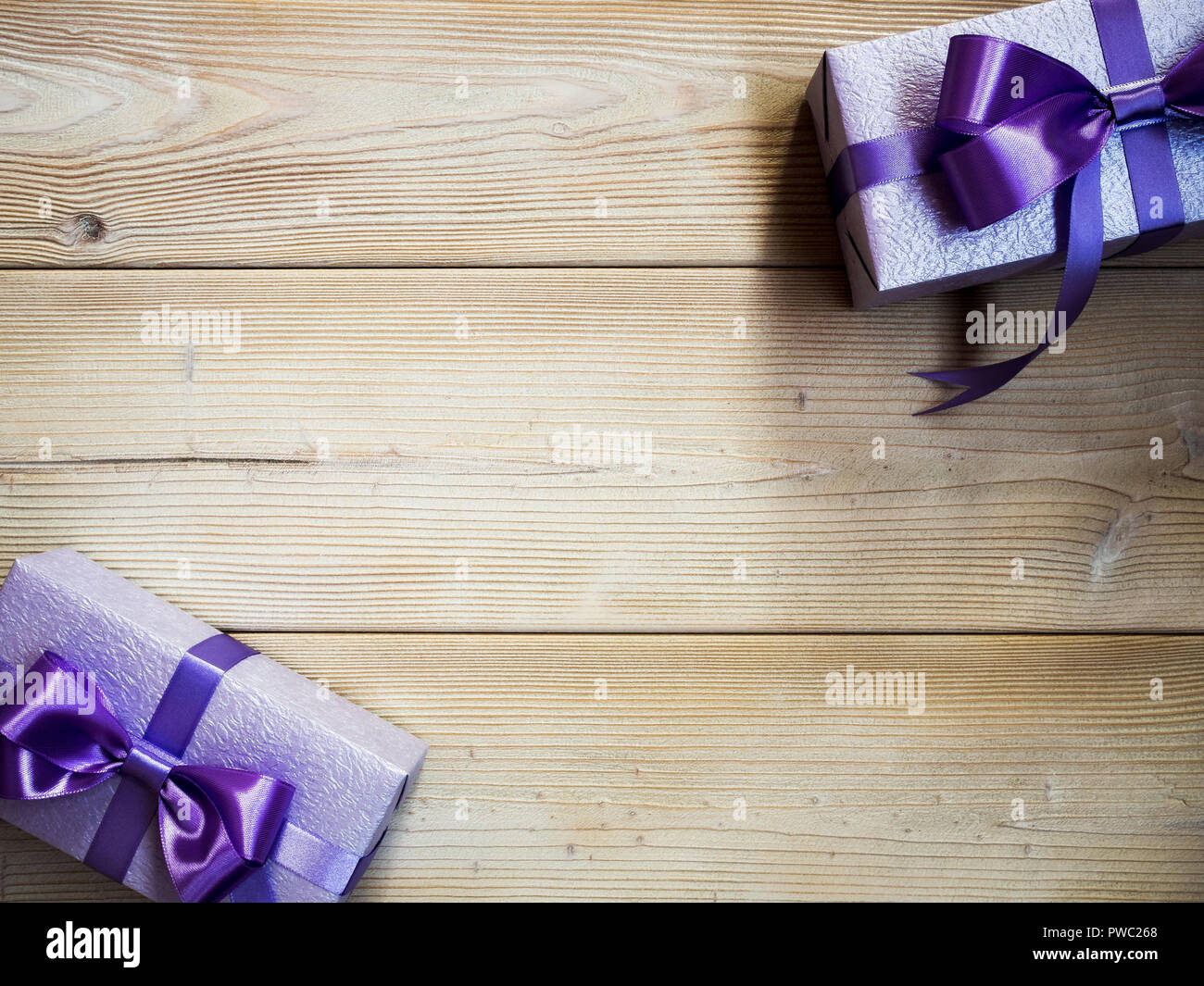 Composition of packed present boxes on wooden board. Celebrations ...