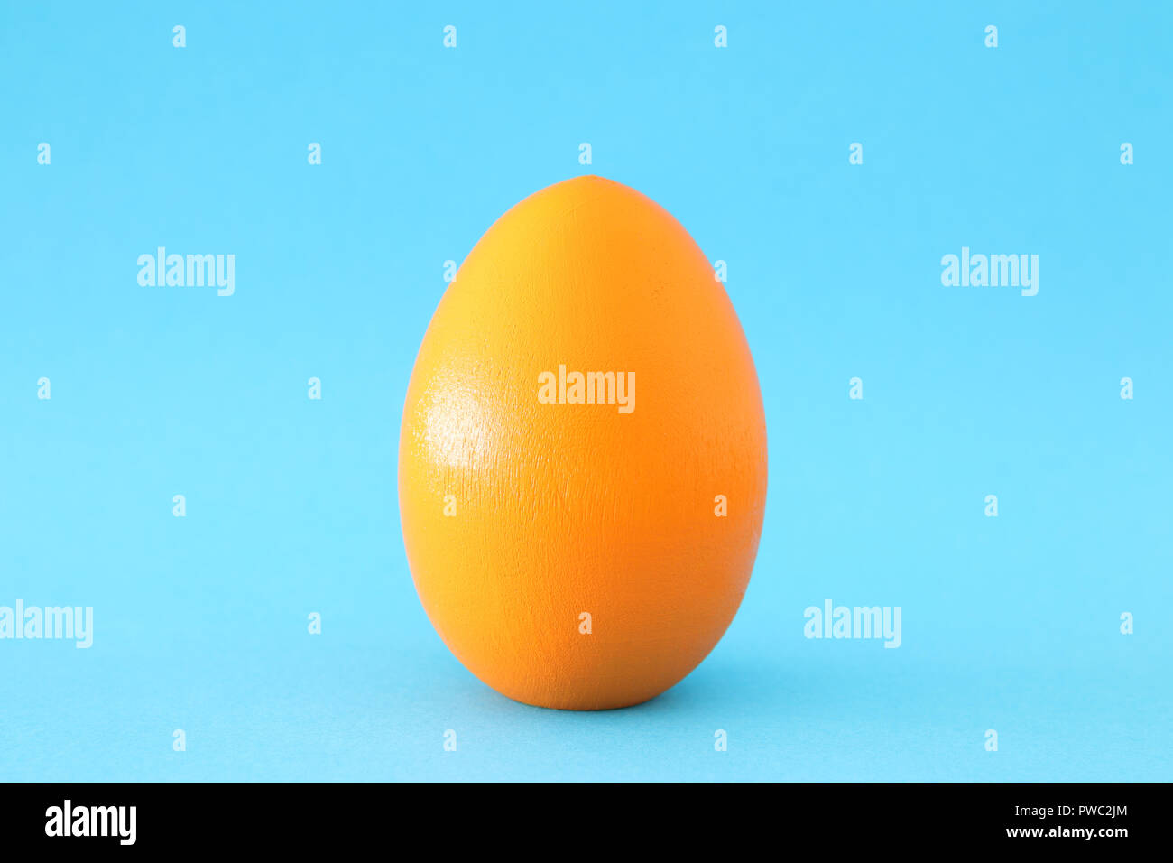 concept image of egg shape over blue pastel background. minimal an pop ...