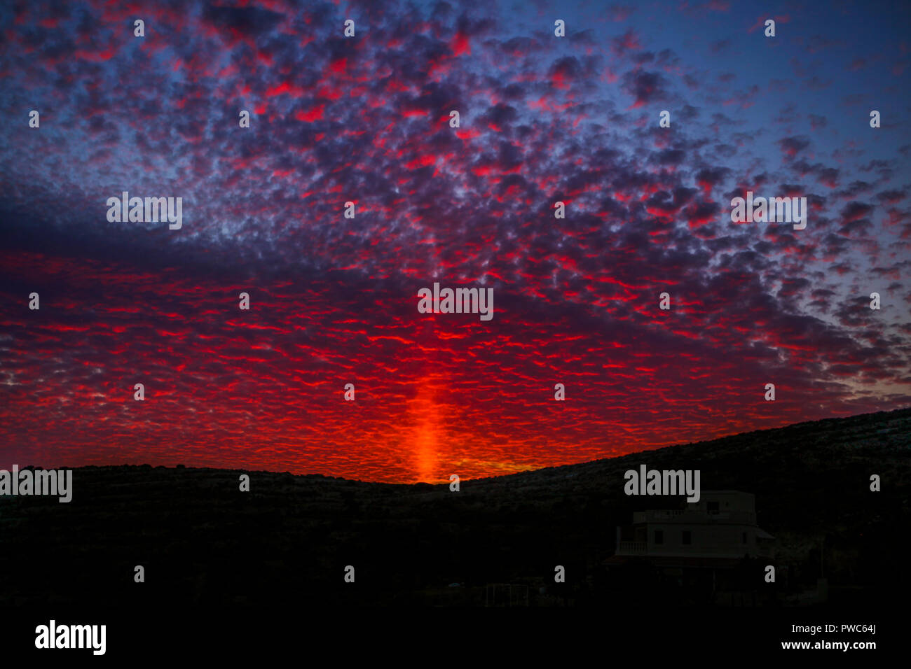 Beautiful dark red sunset . This was the real color Stock Photo - Alamy