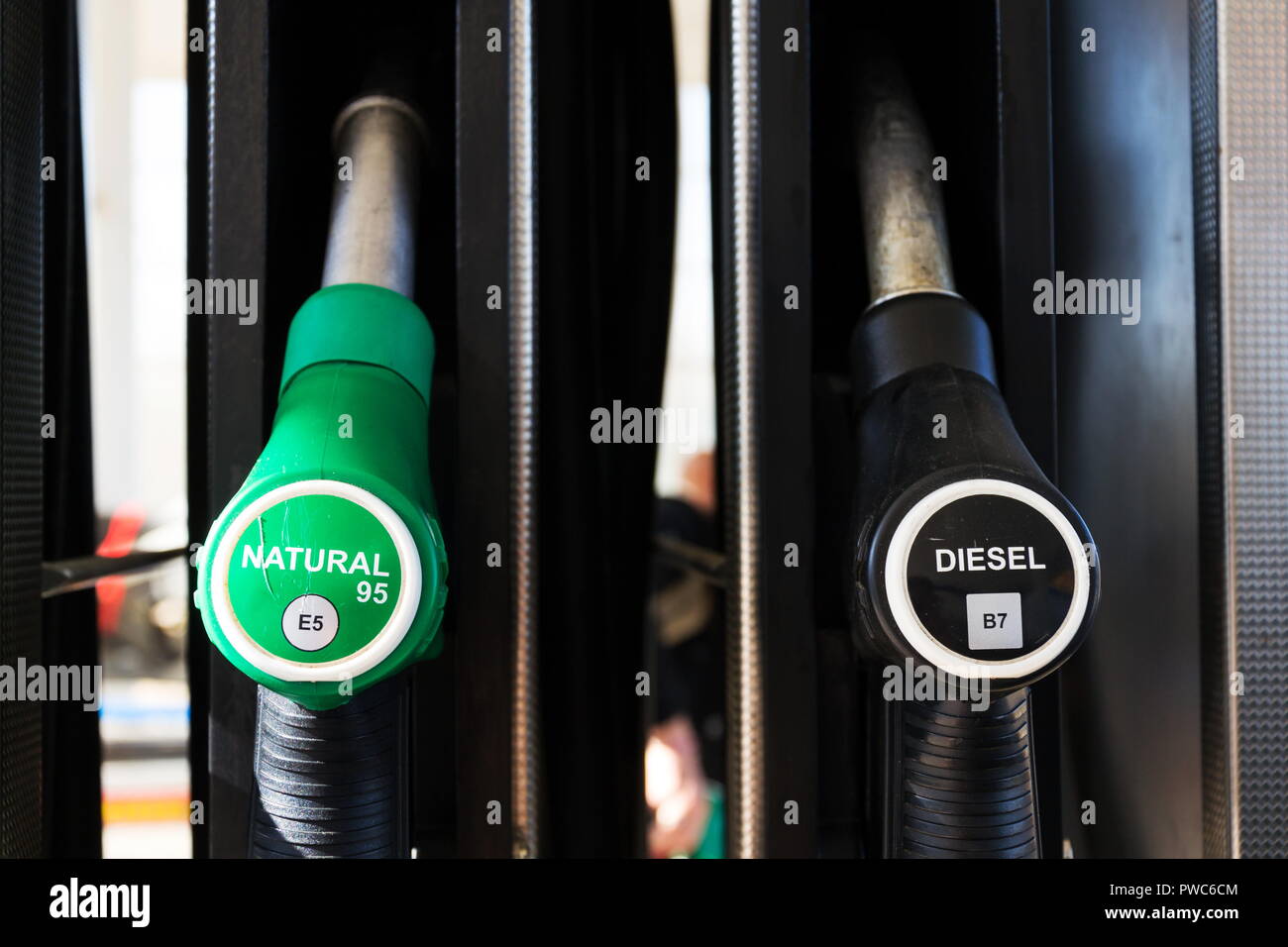 New fuel labeling at petrol station pumps with new EU labels, sunny ...