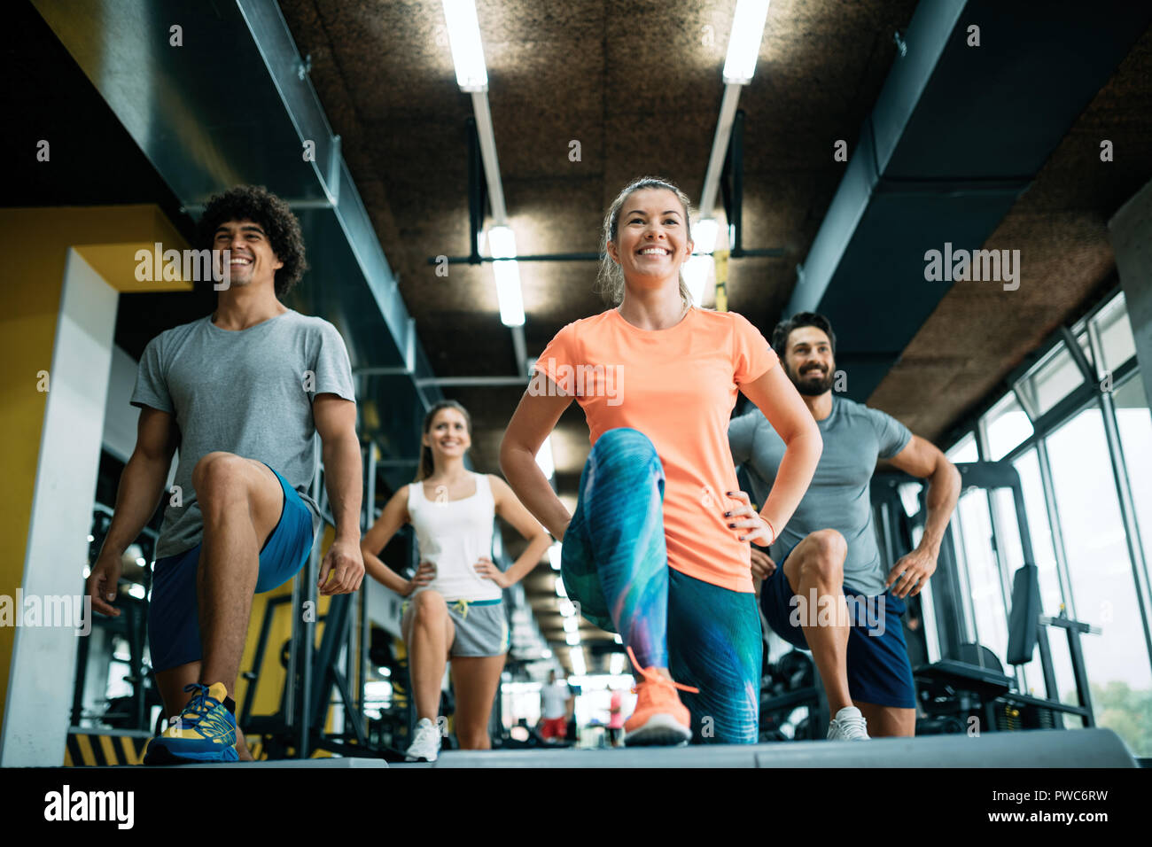 Team workout in gym to reach goals Stock Photo - Alamy