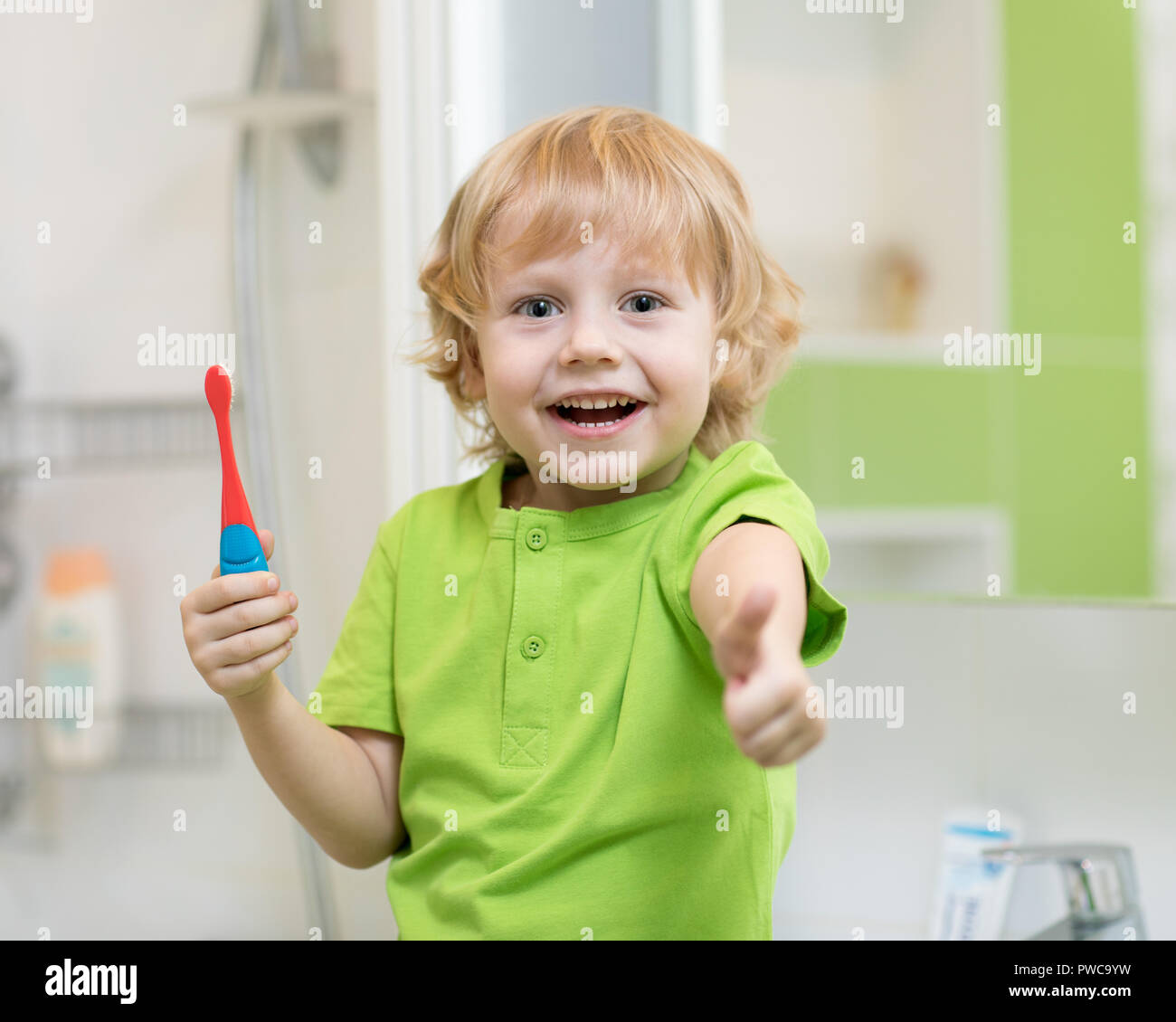 Boy laughing showing teeth hi-res stock photography and images - Alamy