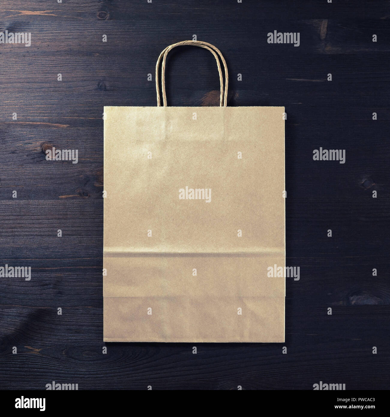 Blank brown paper bag on white background. Responsive design mockup ...