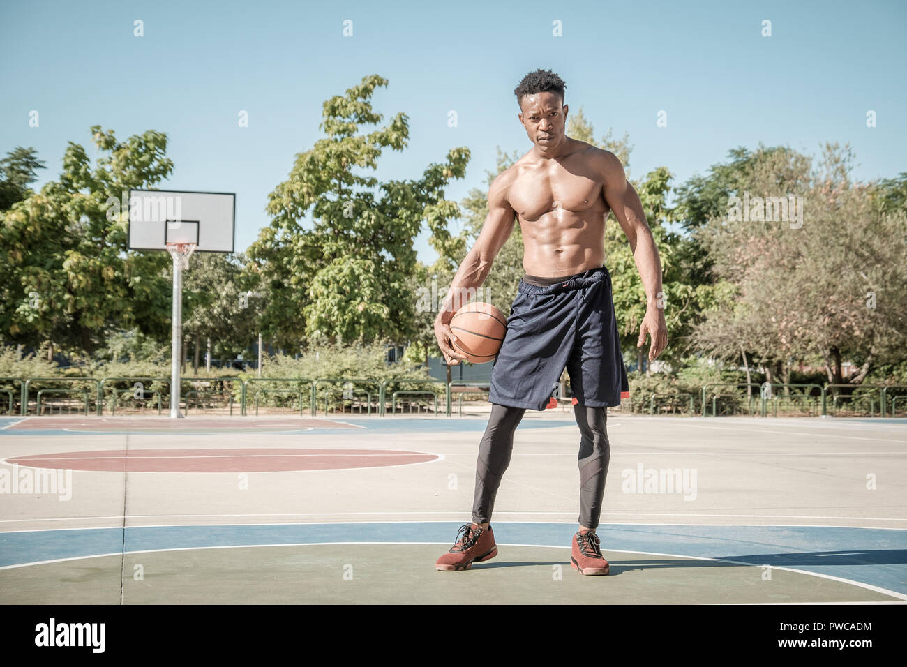 Black basketball player standing in hi-res stock photography and images ...