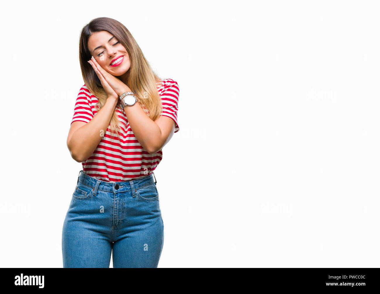 Young beautiful woman casual look over isolated background sleeping ...