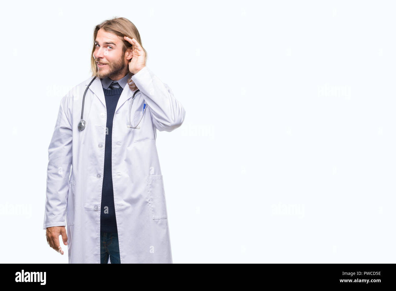Young handsome doctor man with long hair over isolated background ...