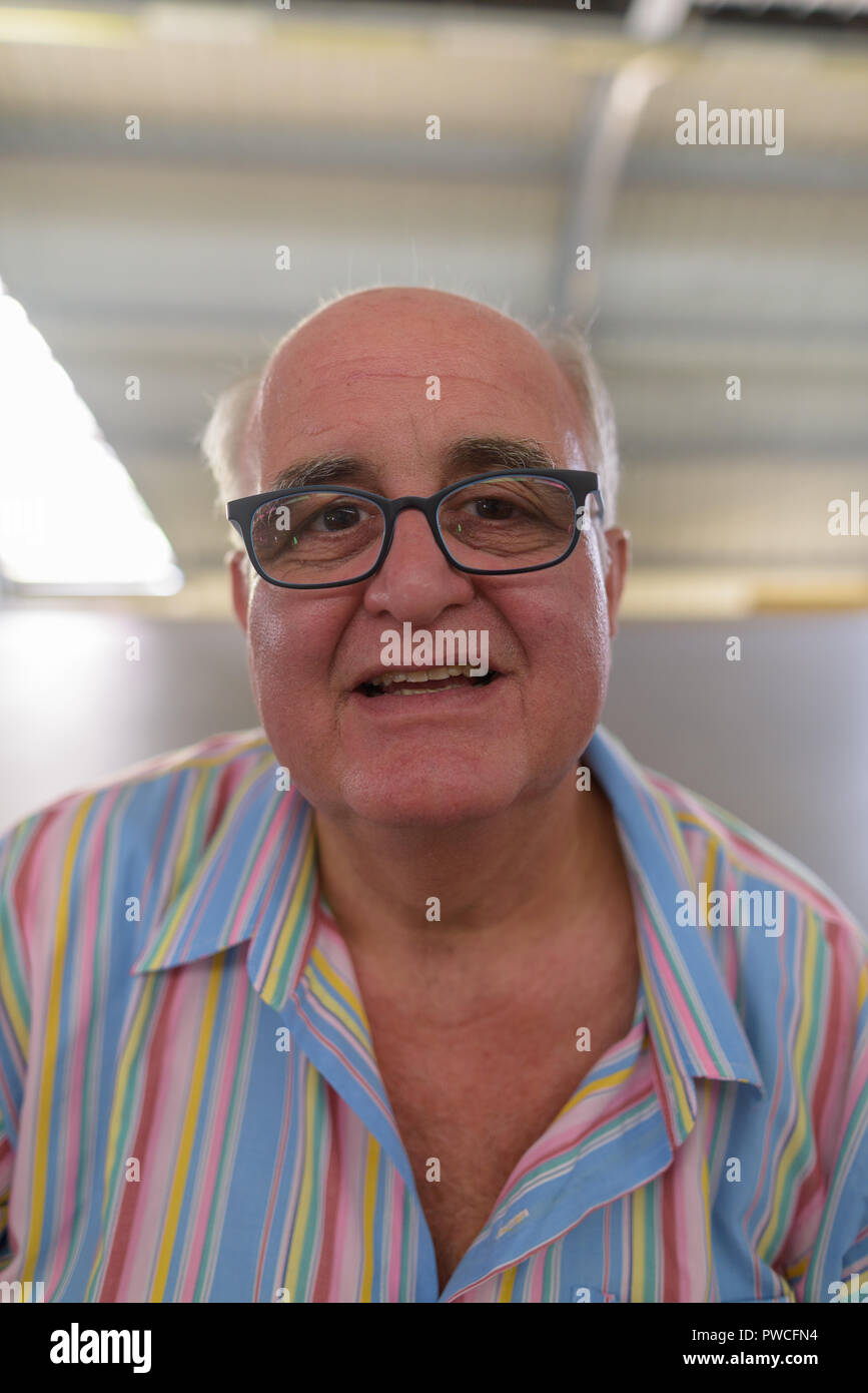 Overweight senior tourist man exploring around the city of Bangk Stock ...