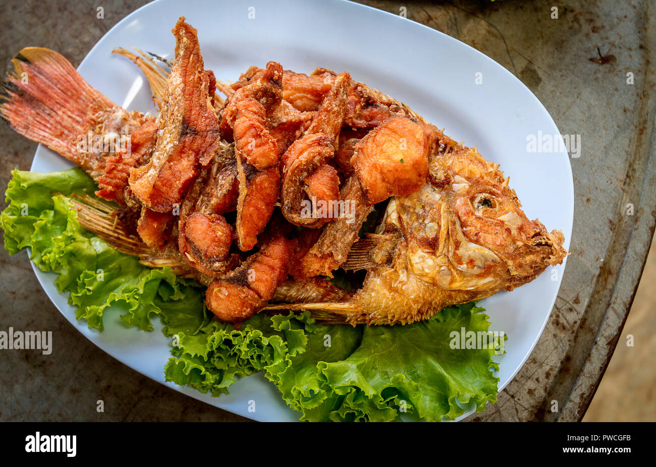 Fried snapper served family style in Thailand Asia Stock Photo - Alamy