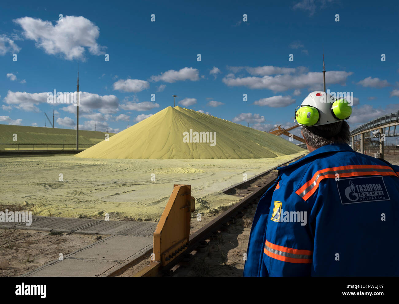 Sulfur piles storage at the PAO Gazprom factory in Astrakhan, Russia ...
