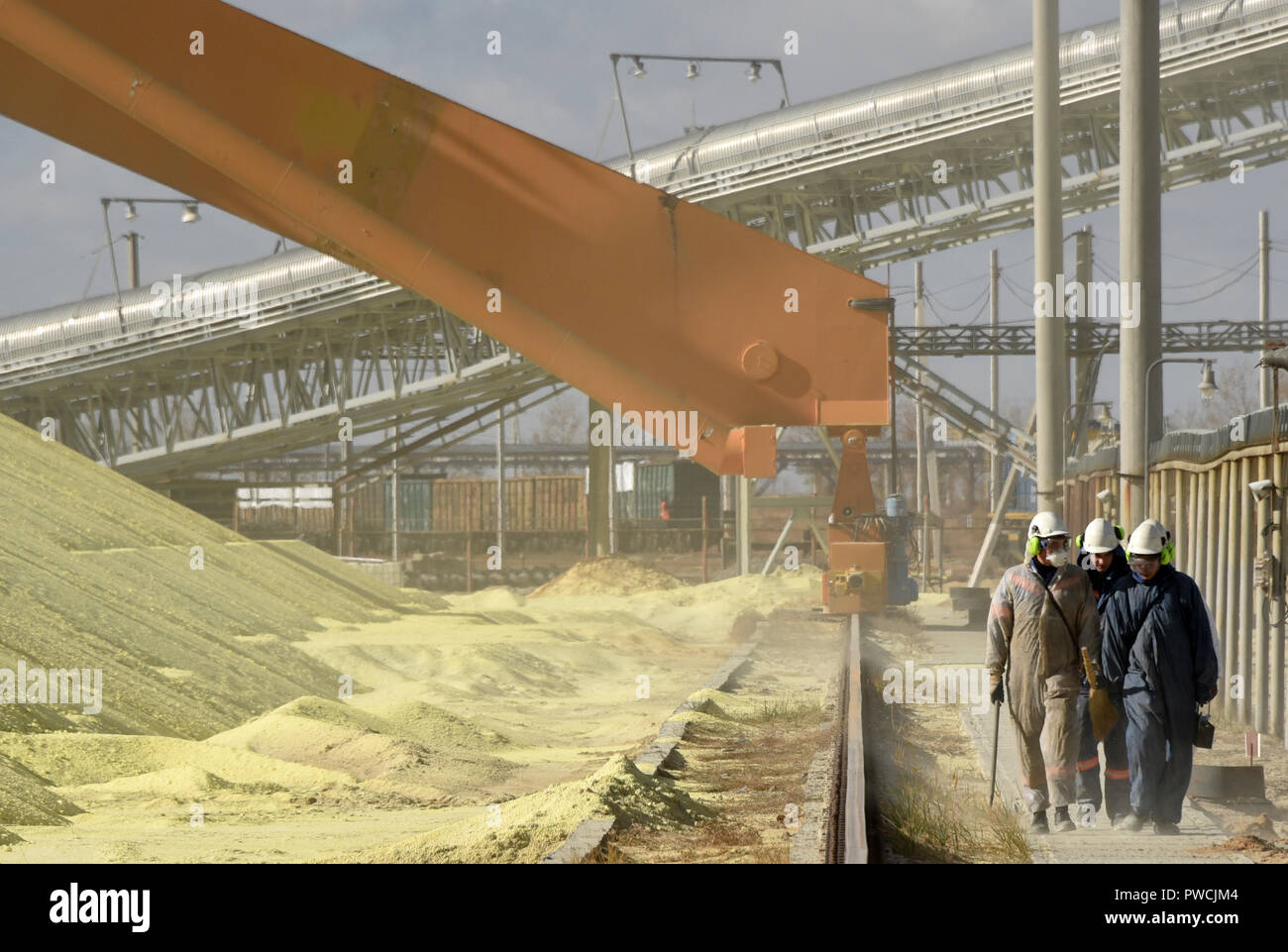 Sulfur piles storage at the PAO Gazprom factory in Astrakhan, Russia ...