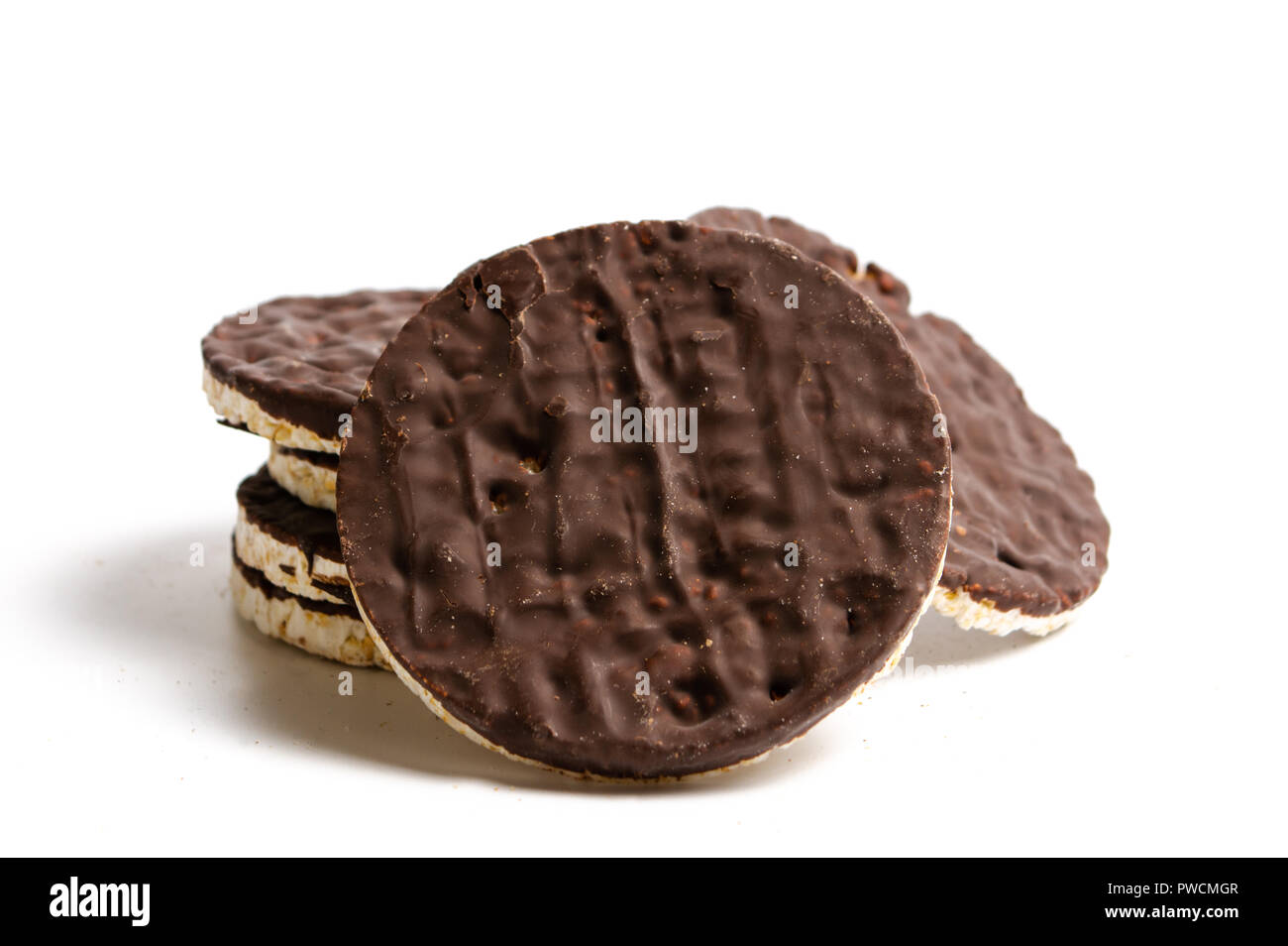 Chocolate covered corn plates snack dessert Stock Photo - Alamy