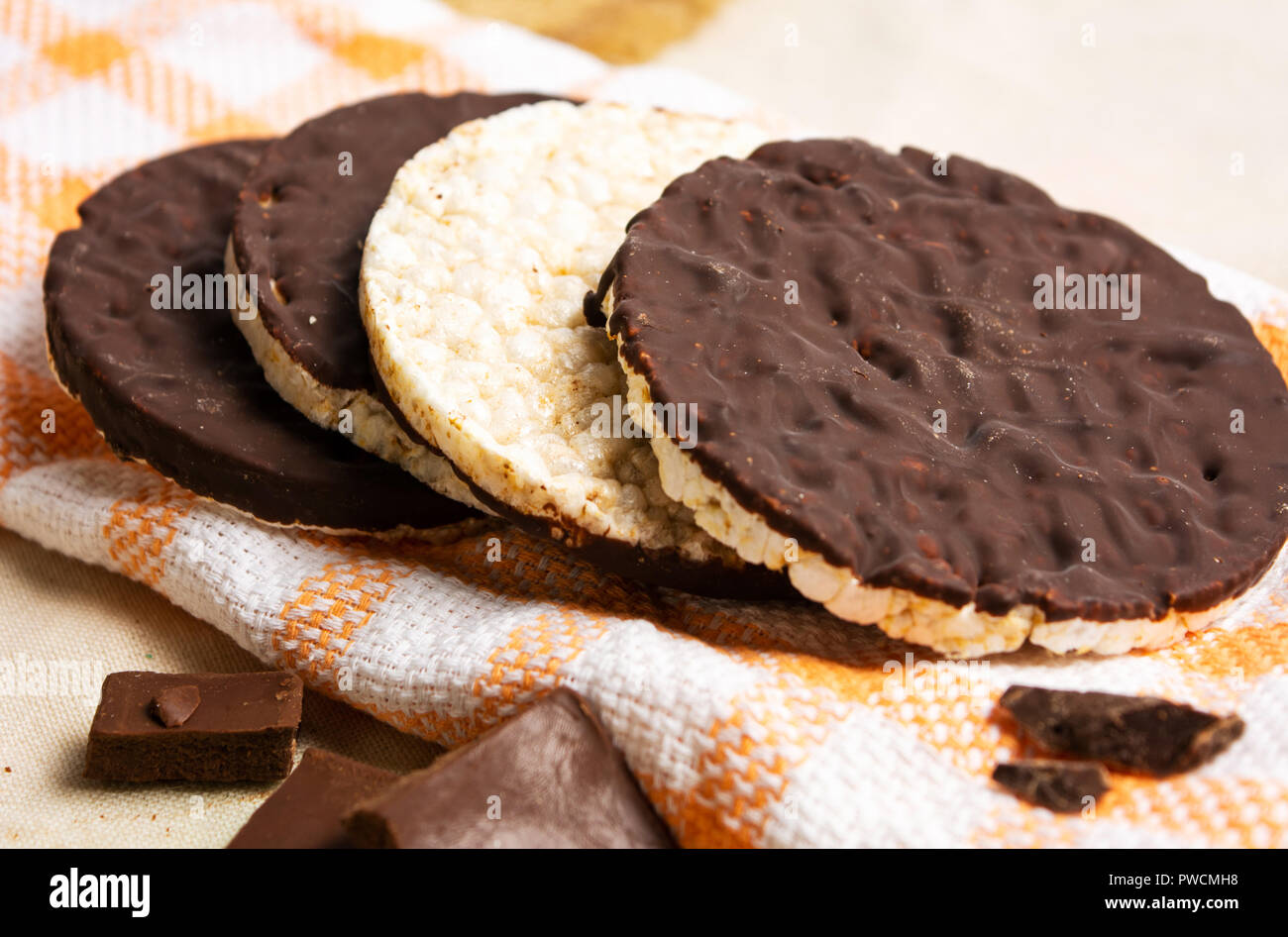 Chocolate covered corn plates snack dessert Stock Photo - Alamy