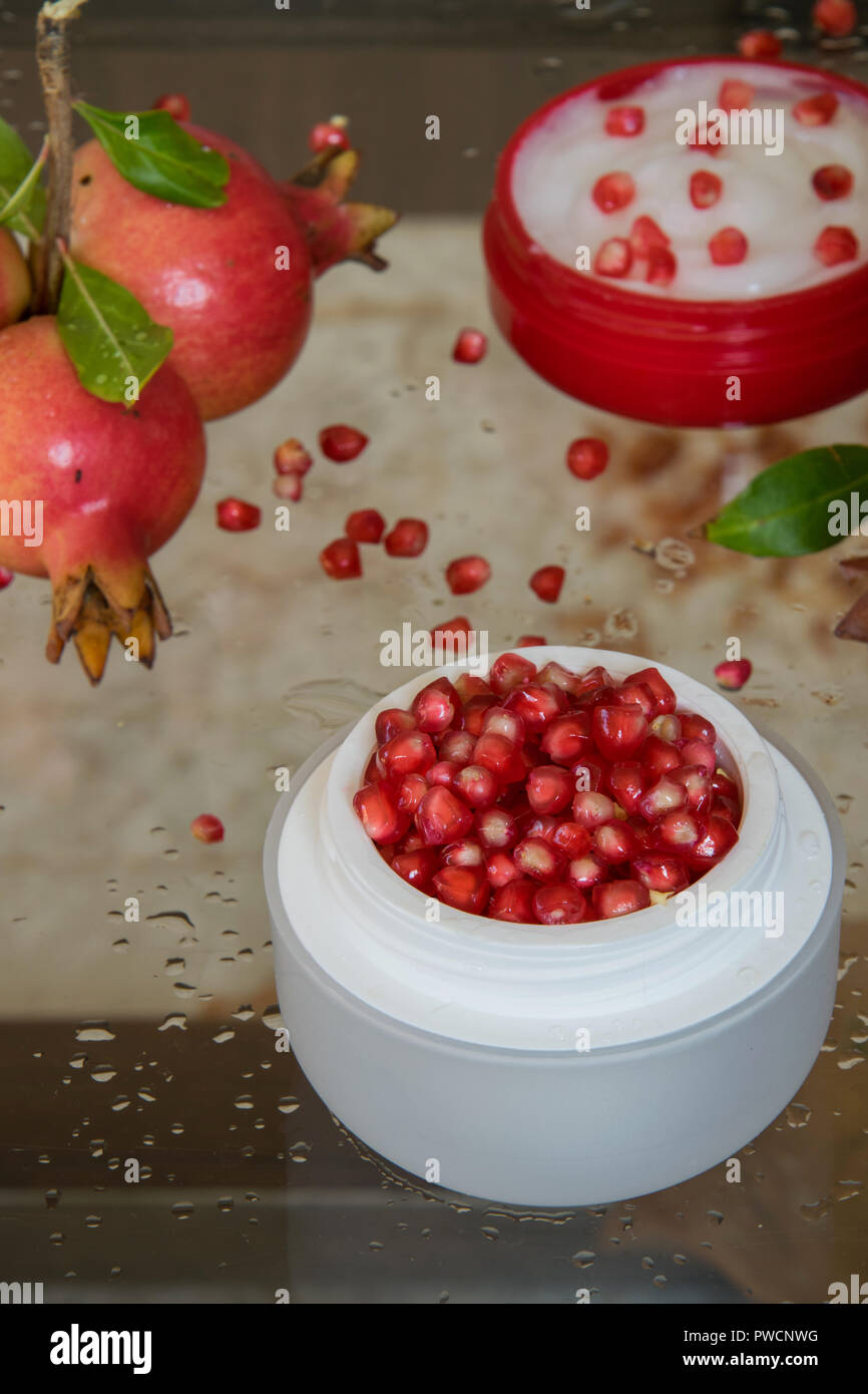 Pomegranate Anti-aging face cream, beauty cosmetics industry Stock ...