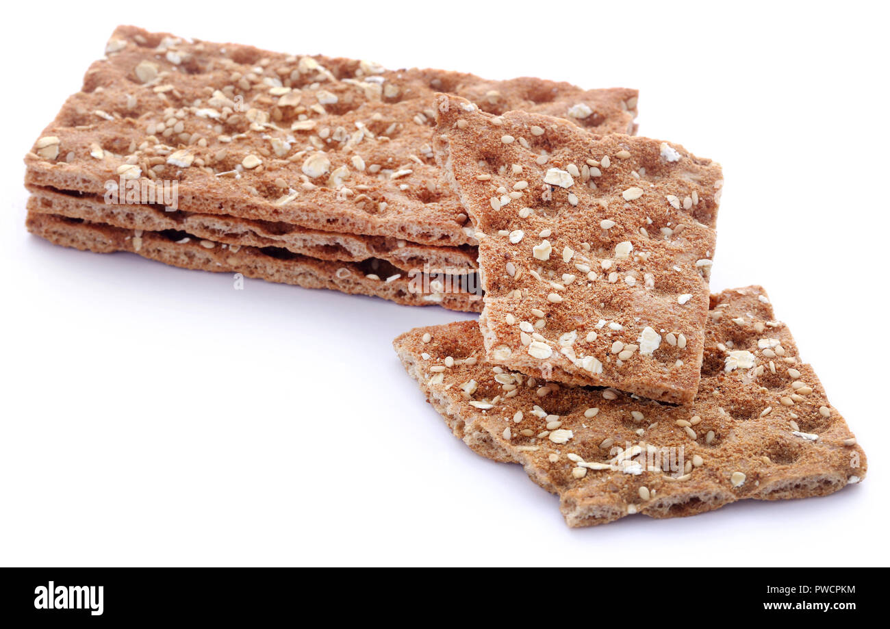Crispbread with sesame seeds over white background Stock Photo - Alamy