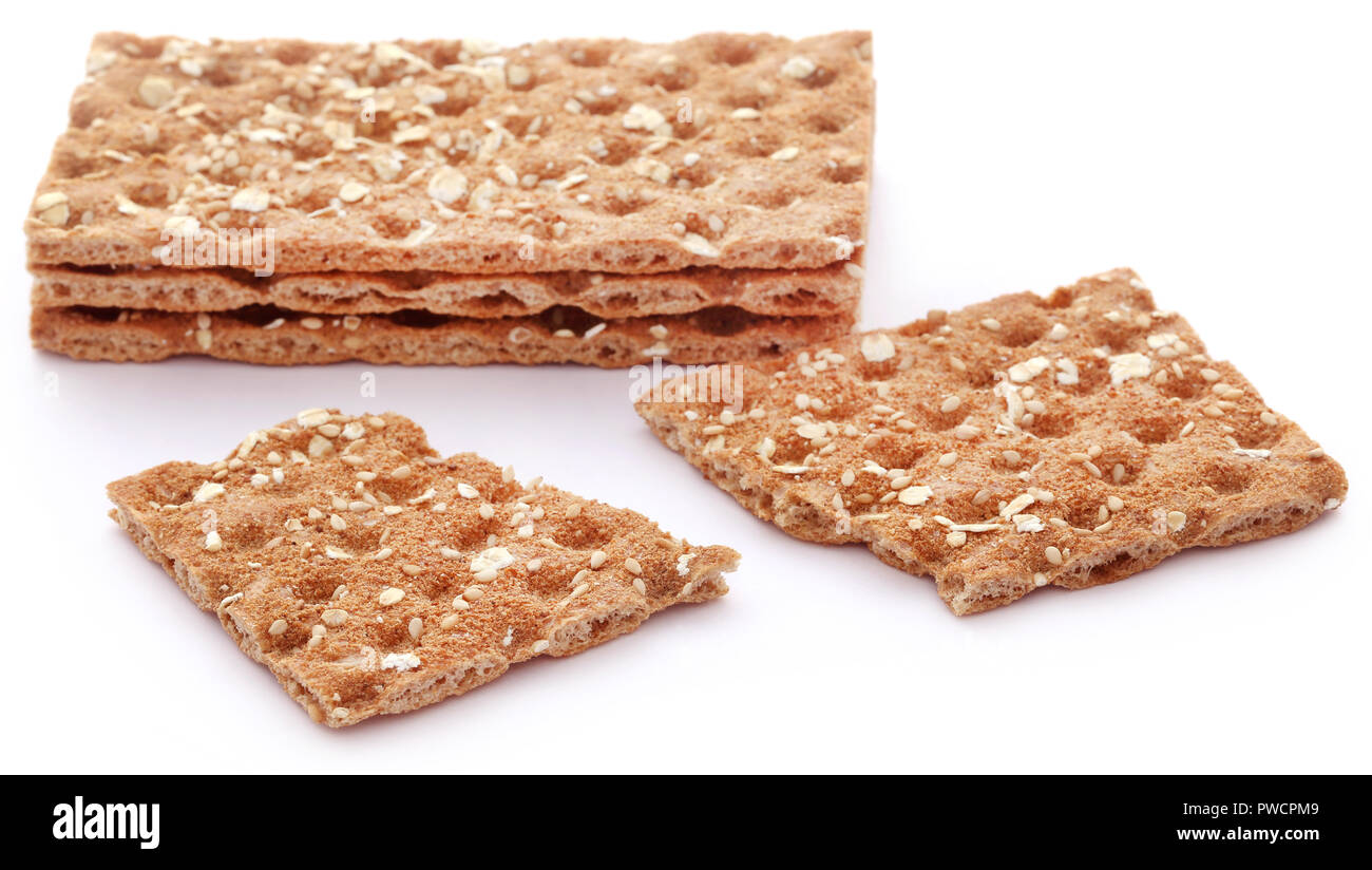 Crispbread with sesame seeds over white background Stock Photo - Alamy