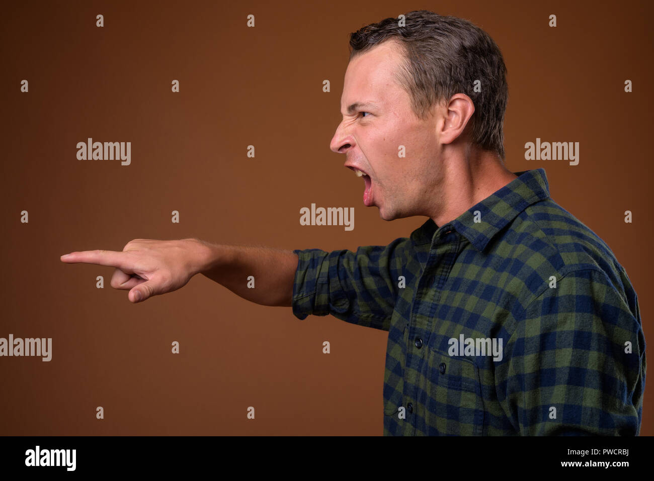 Angry man side profile hi-res stock photography and images - Alamy