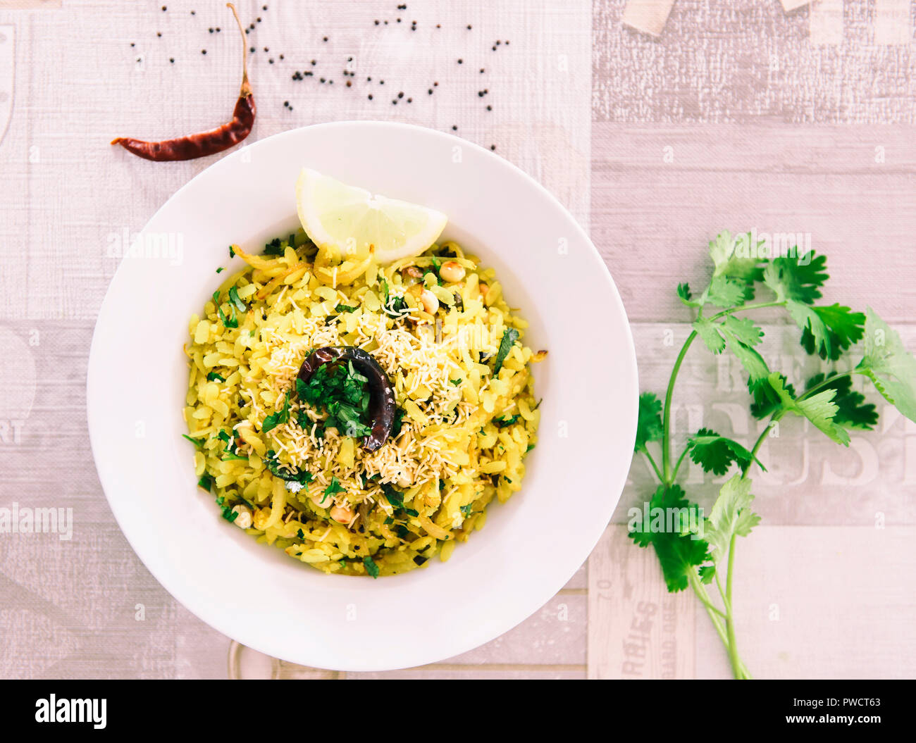 Indian traditional breakfast Poha Stock Photo - Alamy
