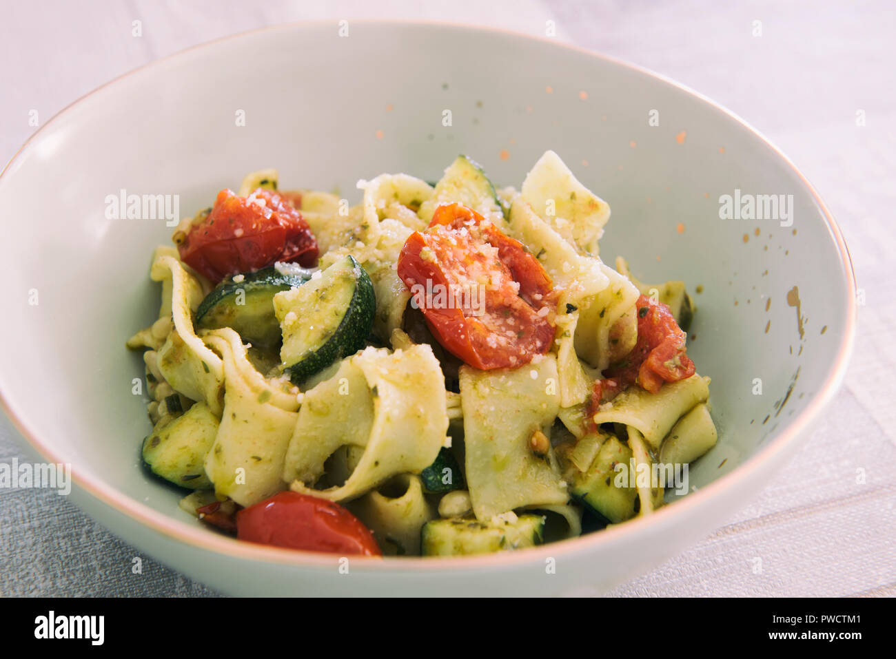 Flat pasta with vegetables Stock Photo - Alamy