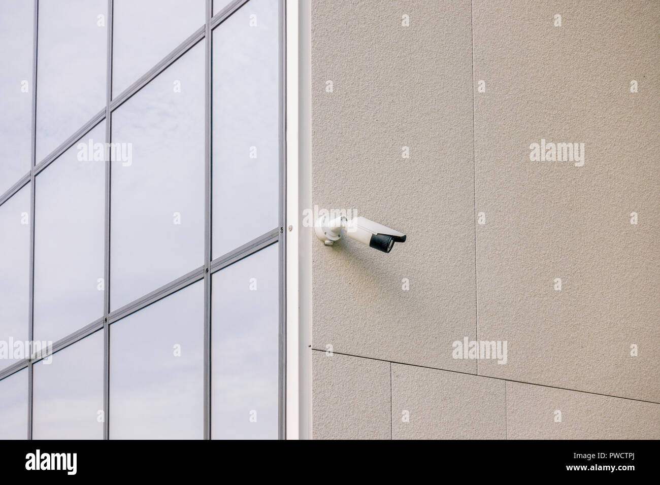 CCTV video camera security system on the wall of the building Stock ...