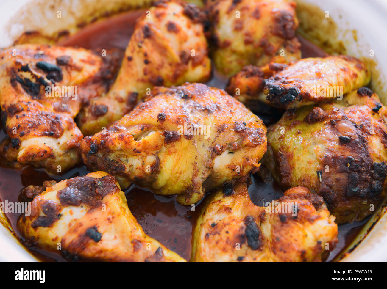 Spicy grilled chicken Stock Photo - Alamy
