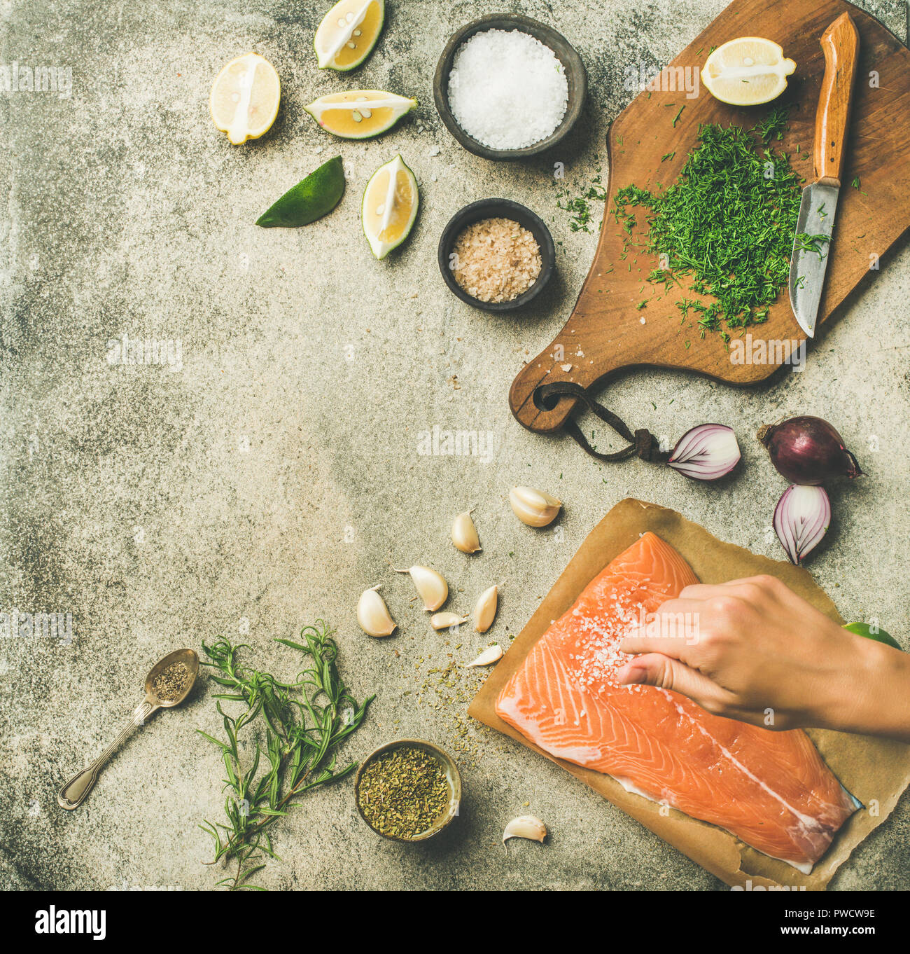 Female hands cooking salted salmon fish fillet Stock Photo - Alamy