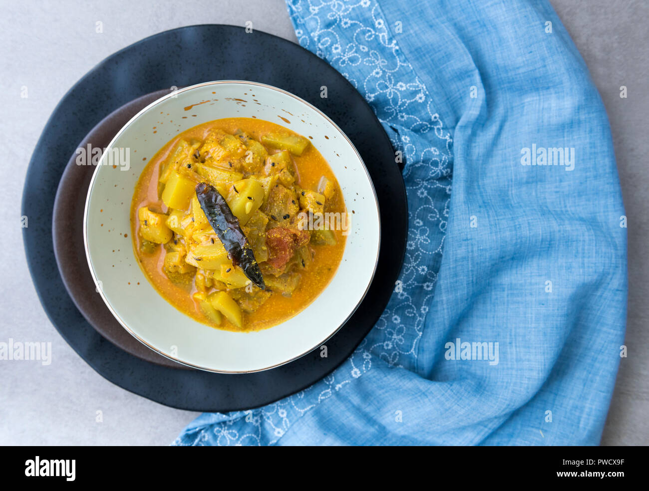Bottle gourd curry with mustard sauce Stock Photo - Alamy