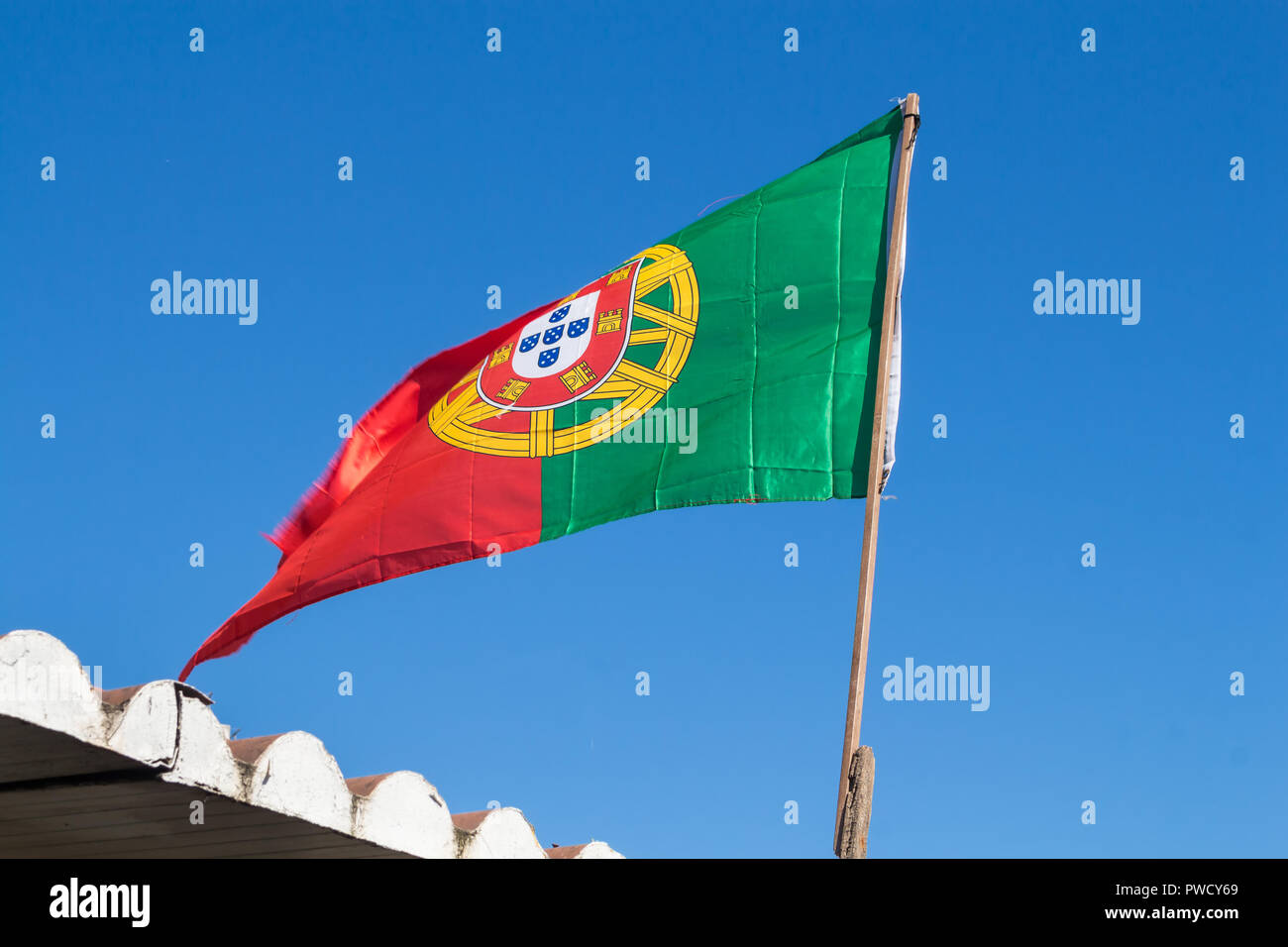 Portuguese flag portugal pole flying hi-res stock photography and ...