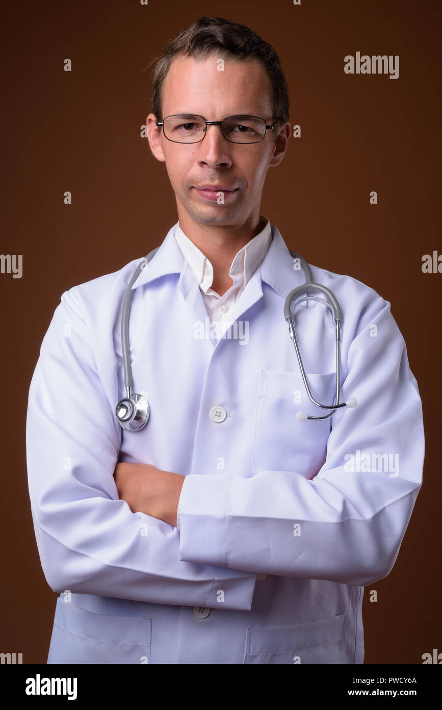 Confident medical doctor hi-res stock photography and images - Alamy