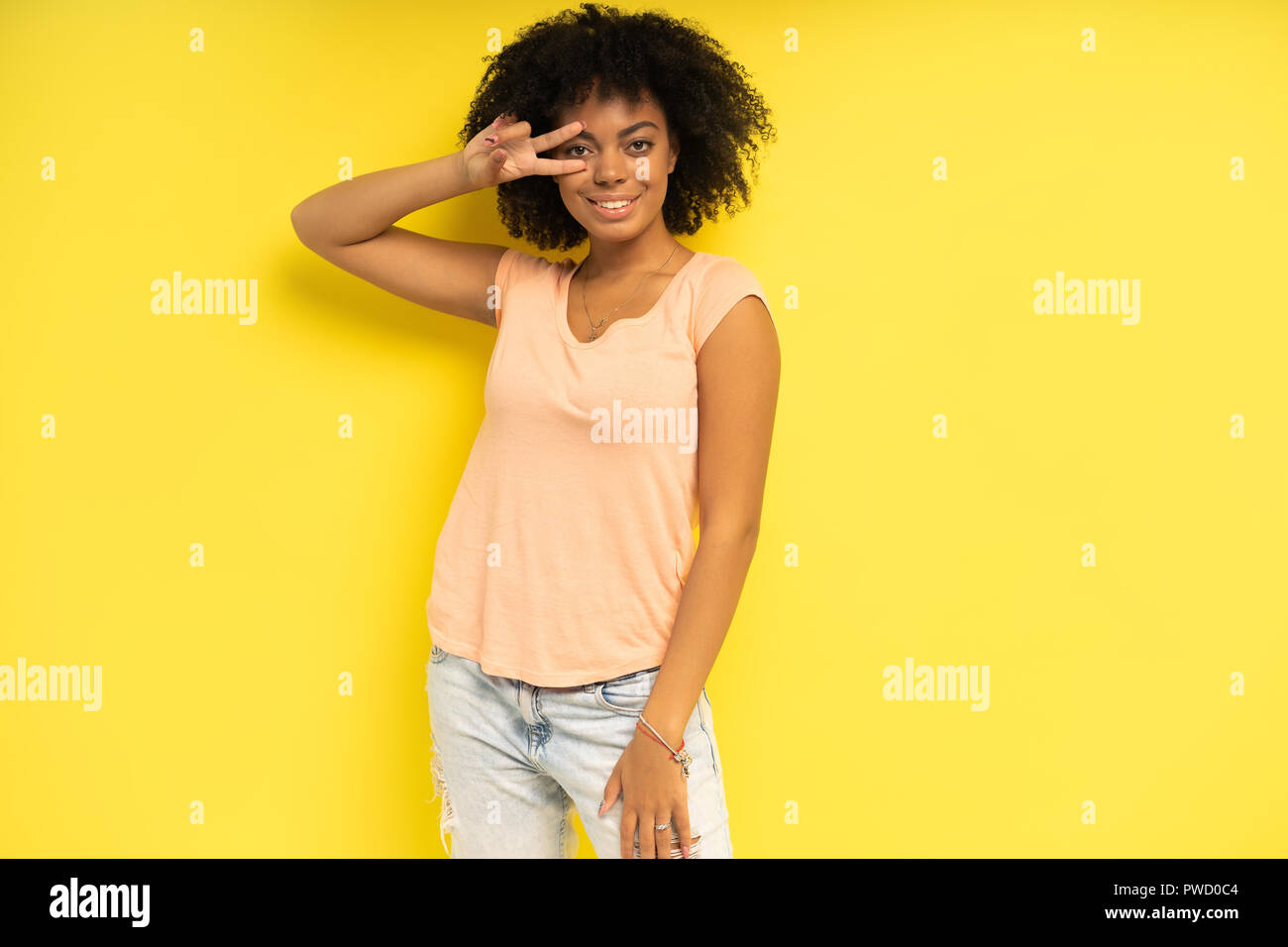 Beautiful african american female model posing in studio Stock Photo ...