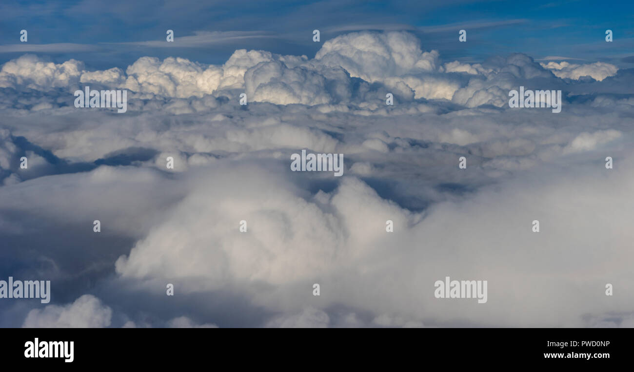 View of clouds from airplane window, a group of clouds in the sky Stock ...