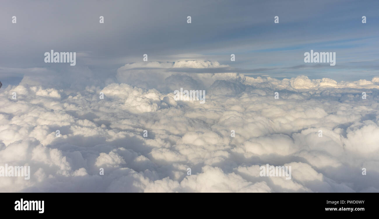 View of clouds from airplane window, a group of clouds in the sky Stock ...