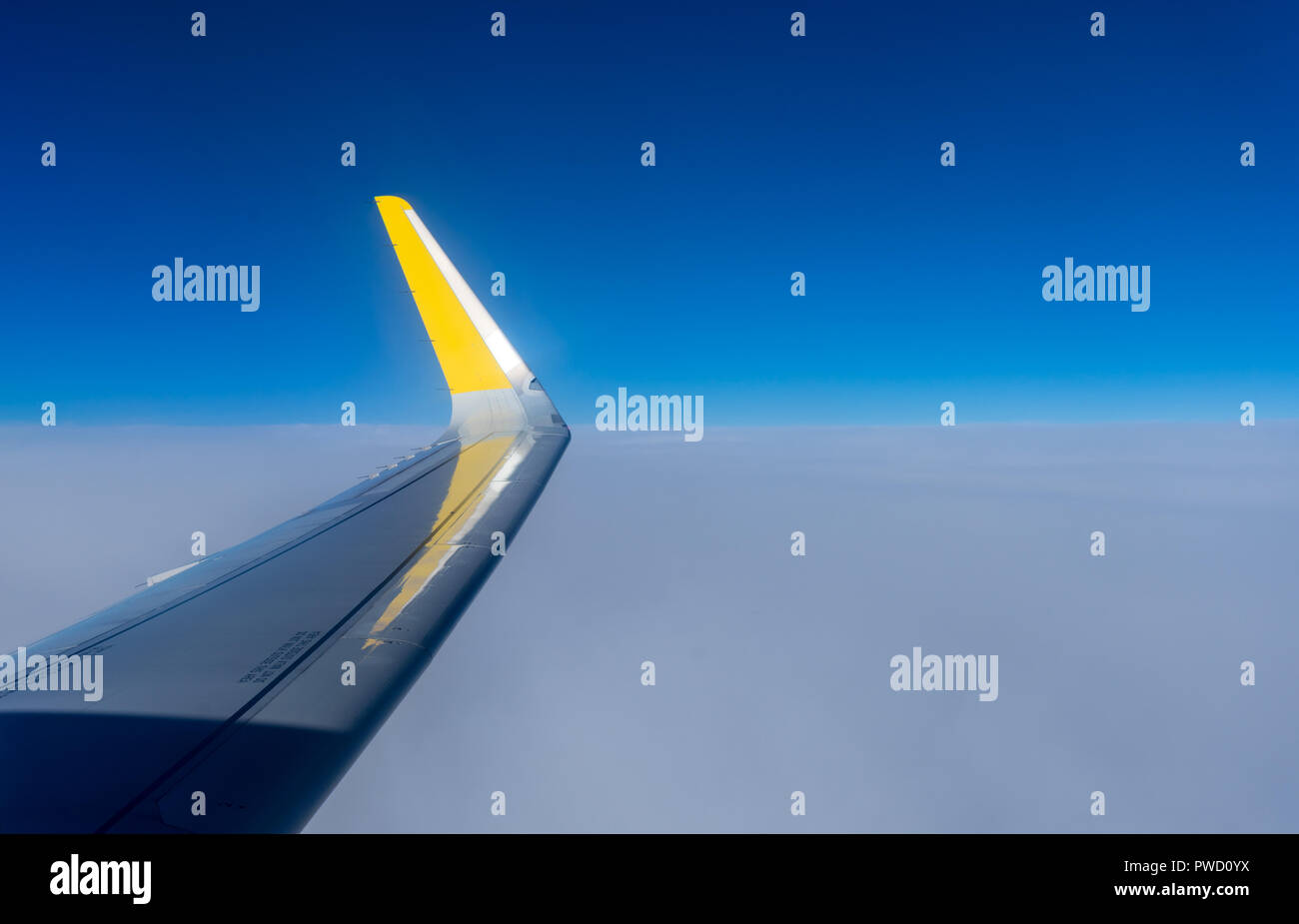 Netherlands, Hague, Schiphol, Europe, a blue and yellow airplane is ...