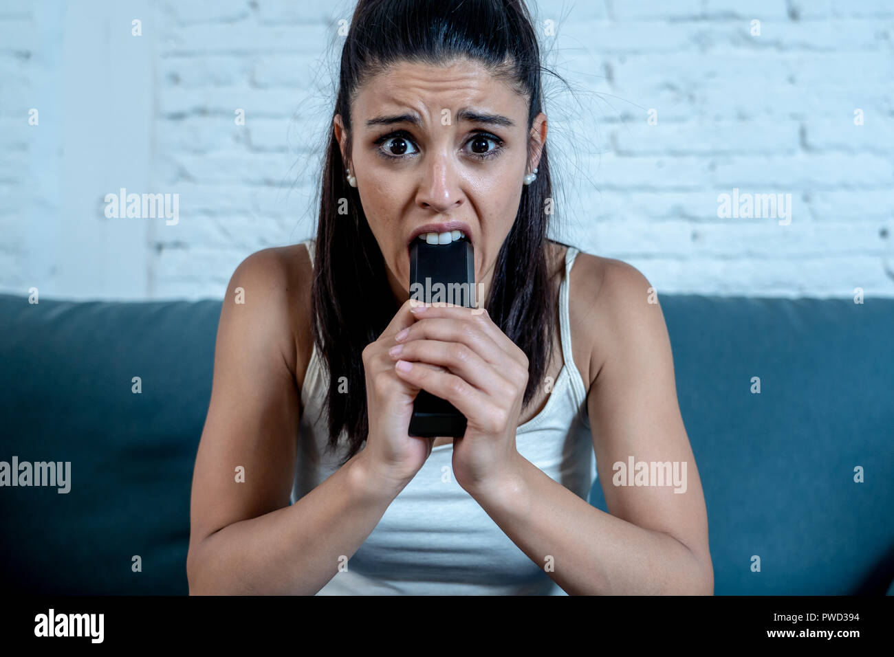 Watching scary film cinema hi-res stock photography and images - Alamy