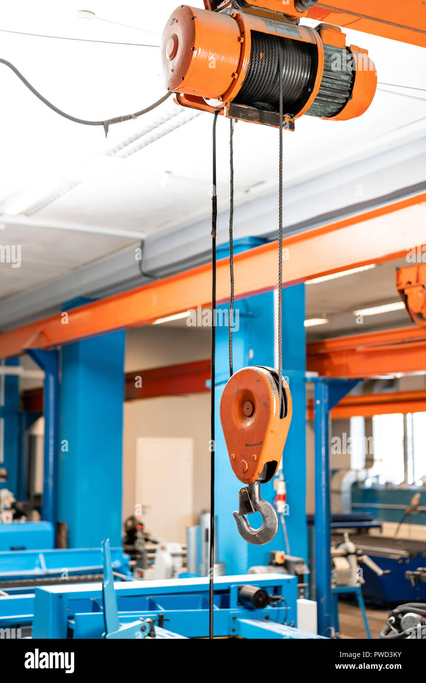 Crane hook. The system of pulleys and ropes, a hanging mechanism in the ...