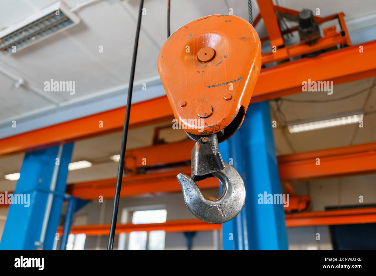 Crane hook. The system of pulleys and ropes, a hanging mechanism in the ...