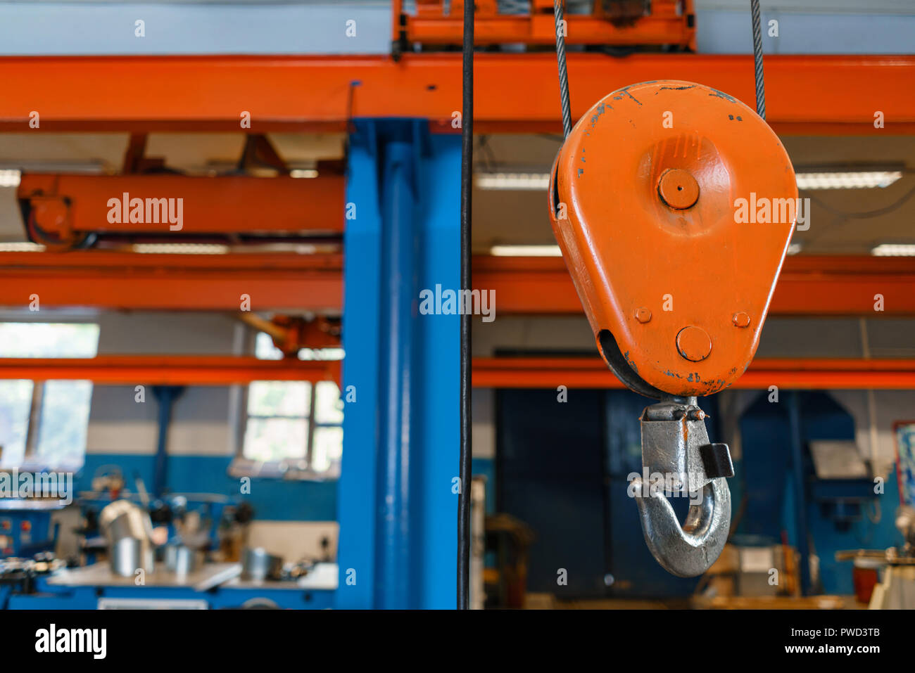 Crane hook. The system of pulleys and ropes, a hanging mechanism in the ...
