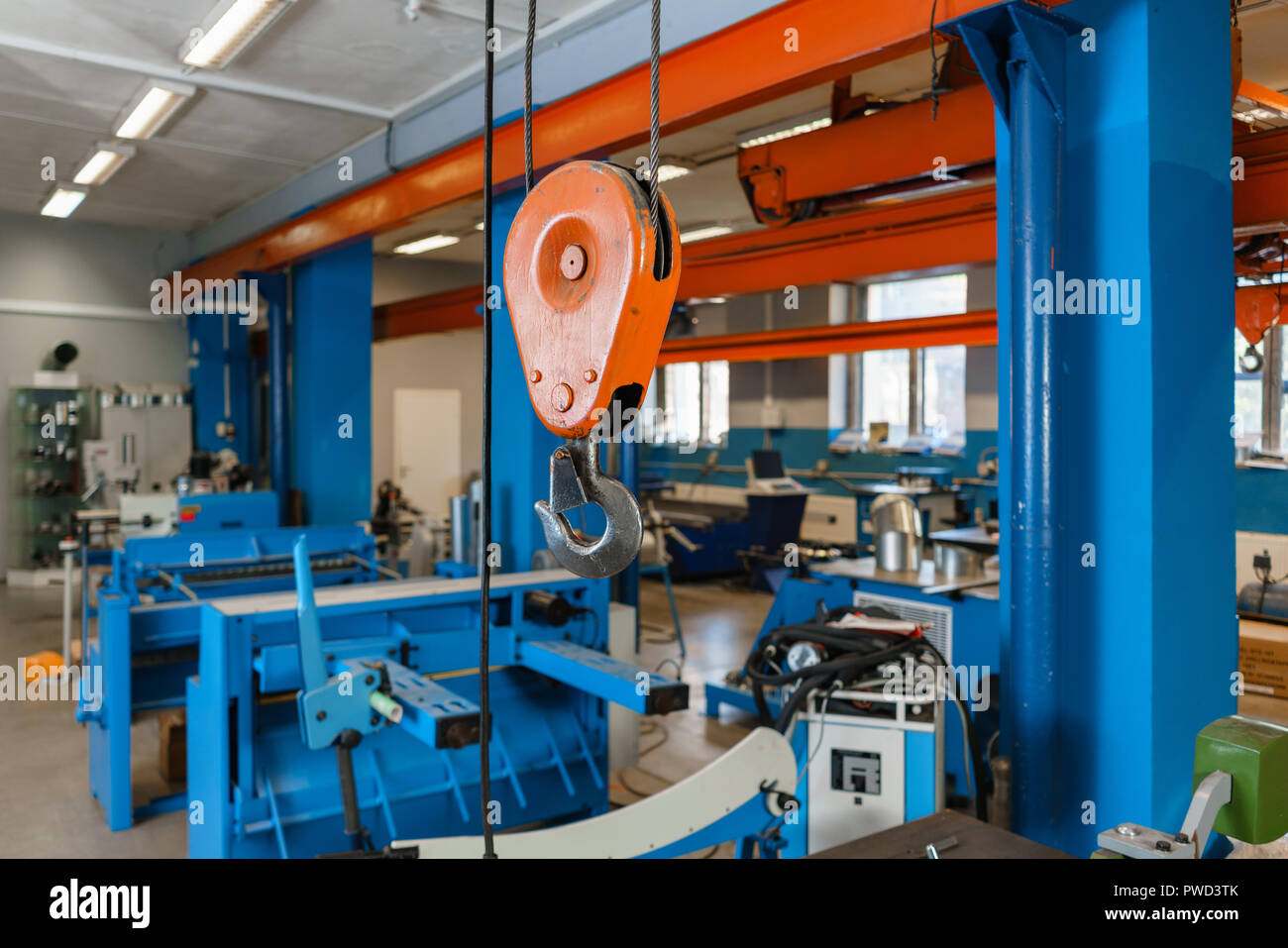 Crane hook. The system of pulleys and ropes, a hanging mechanism in the ...
