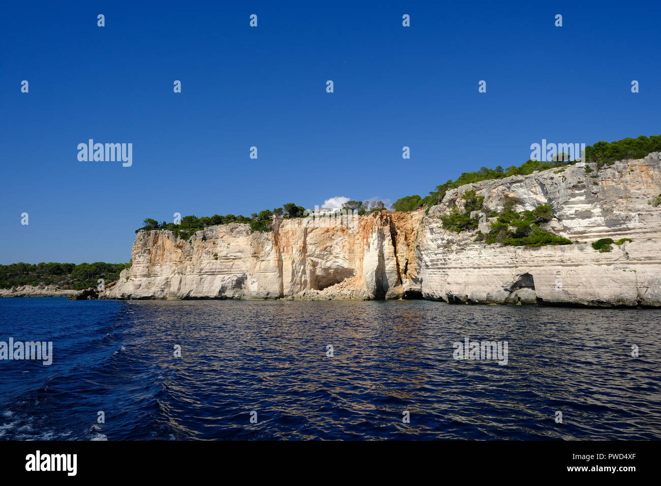 Beautiful beaches, cliffs and coves around the Island of Menorca Cala ...