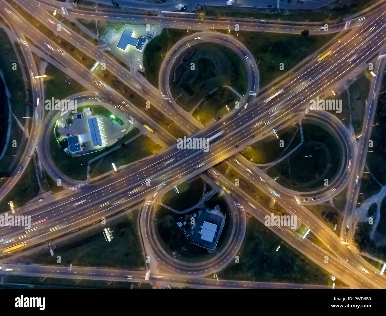 Static vertical top down aerial view of traffic on freeway interchange ...